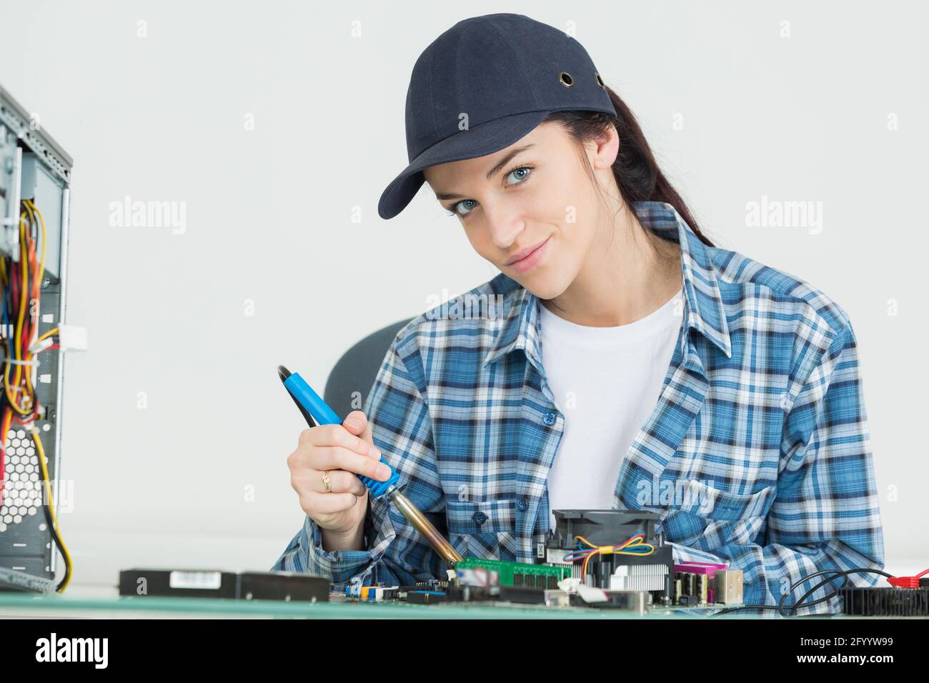 female technician repairing the pc parts Stock Photo - Alamy