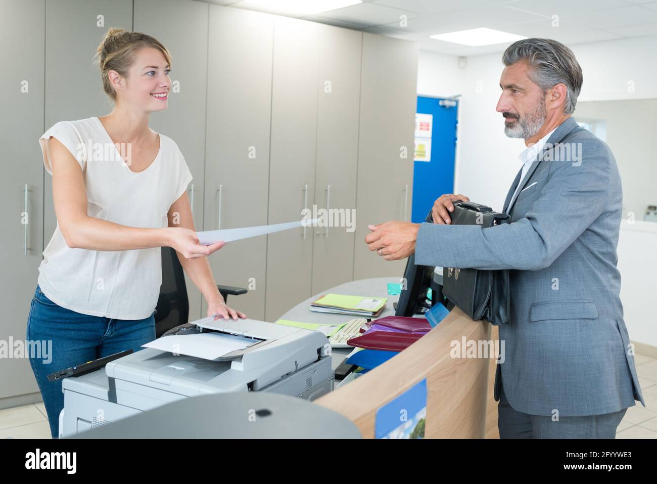 secretary and boss working together Stock Photo - Alamy