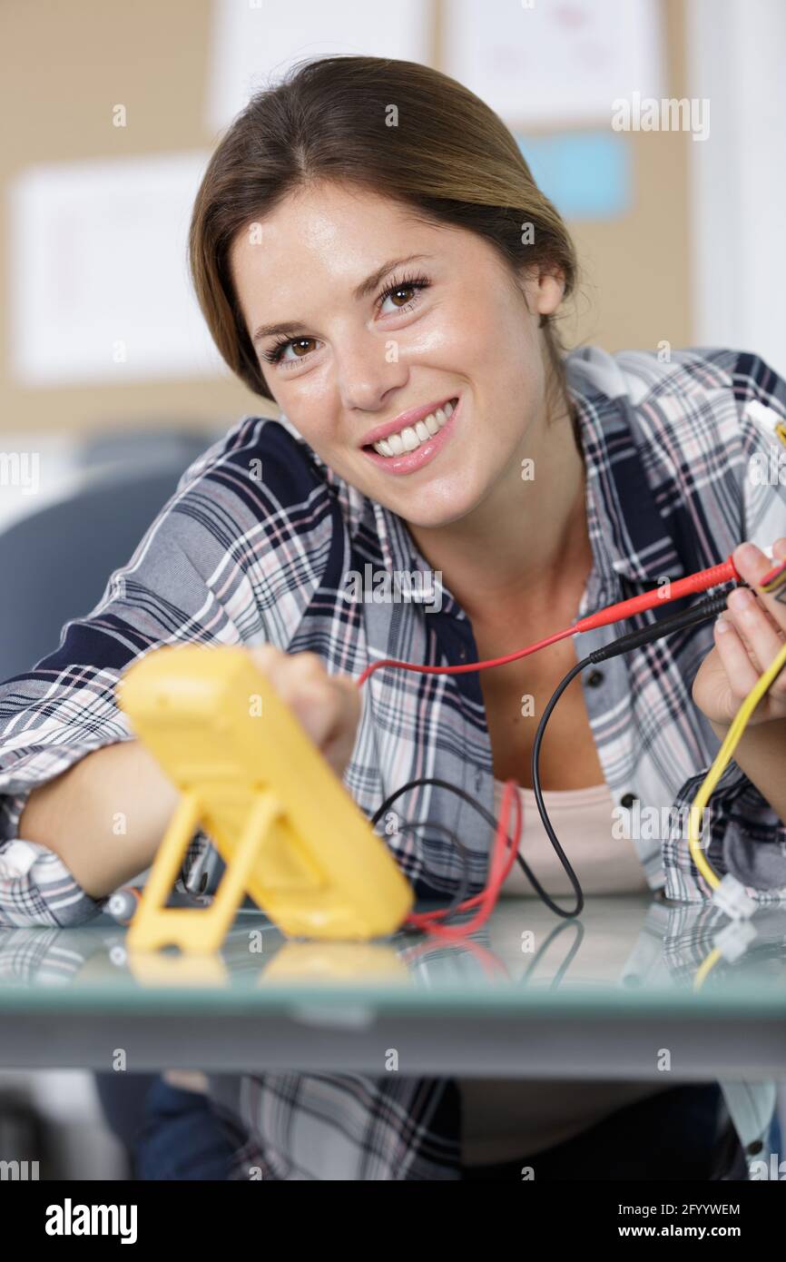 Woman repairing computer part hi-res stock photography and images - Alamy