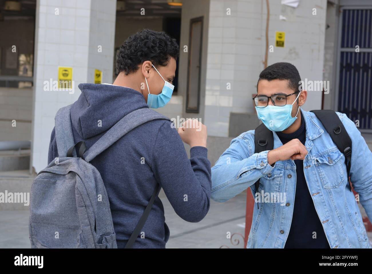 Elbow bump, new normal and safe way of greeting to avoid the spread of ...