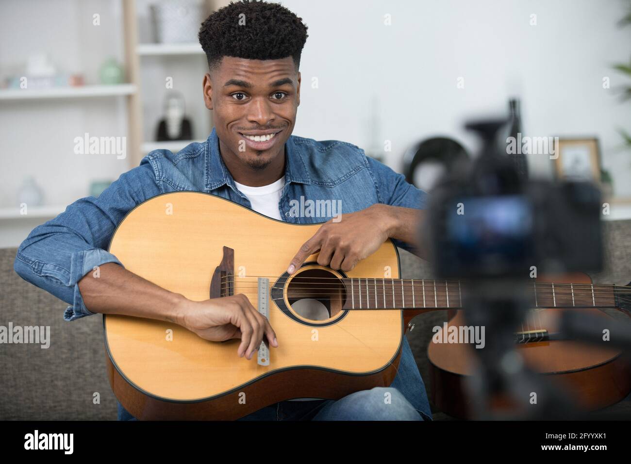 african musician playing guitar Stock Photo - Alamy