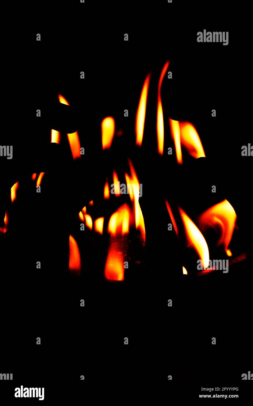 bright fire flames with black back background Stock Photo - Alamy