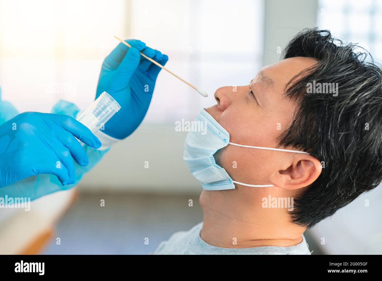 Cotton swab doctor hi-res stock photography and images - Alamy