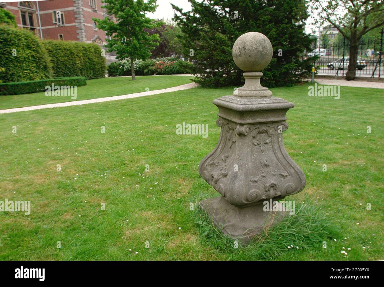 Stone globe on a base; Images in the garden, June 2003 Stock Photo - Alamy