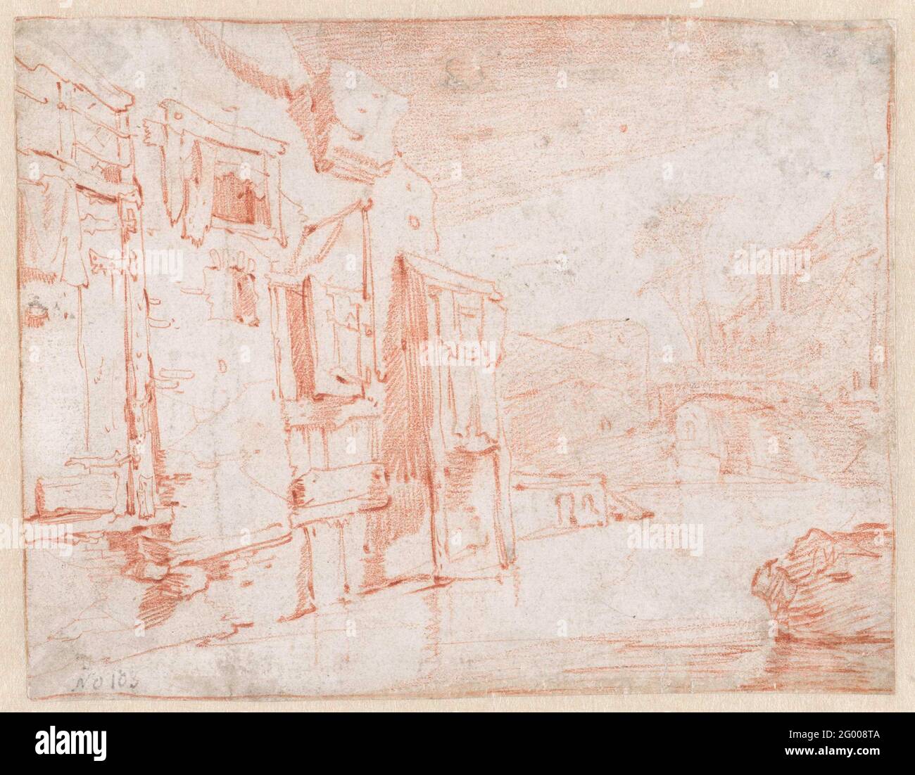 Old houses on a water, in the distance a bridge Stock Photo - Alamy