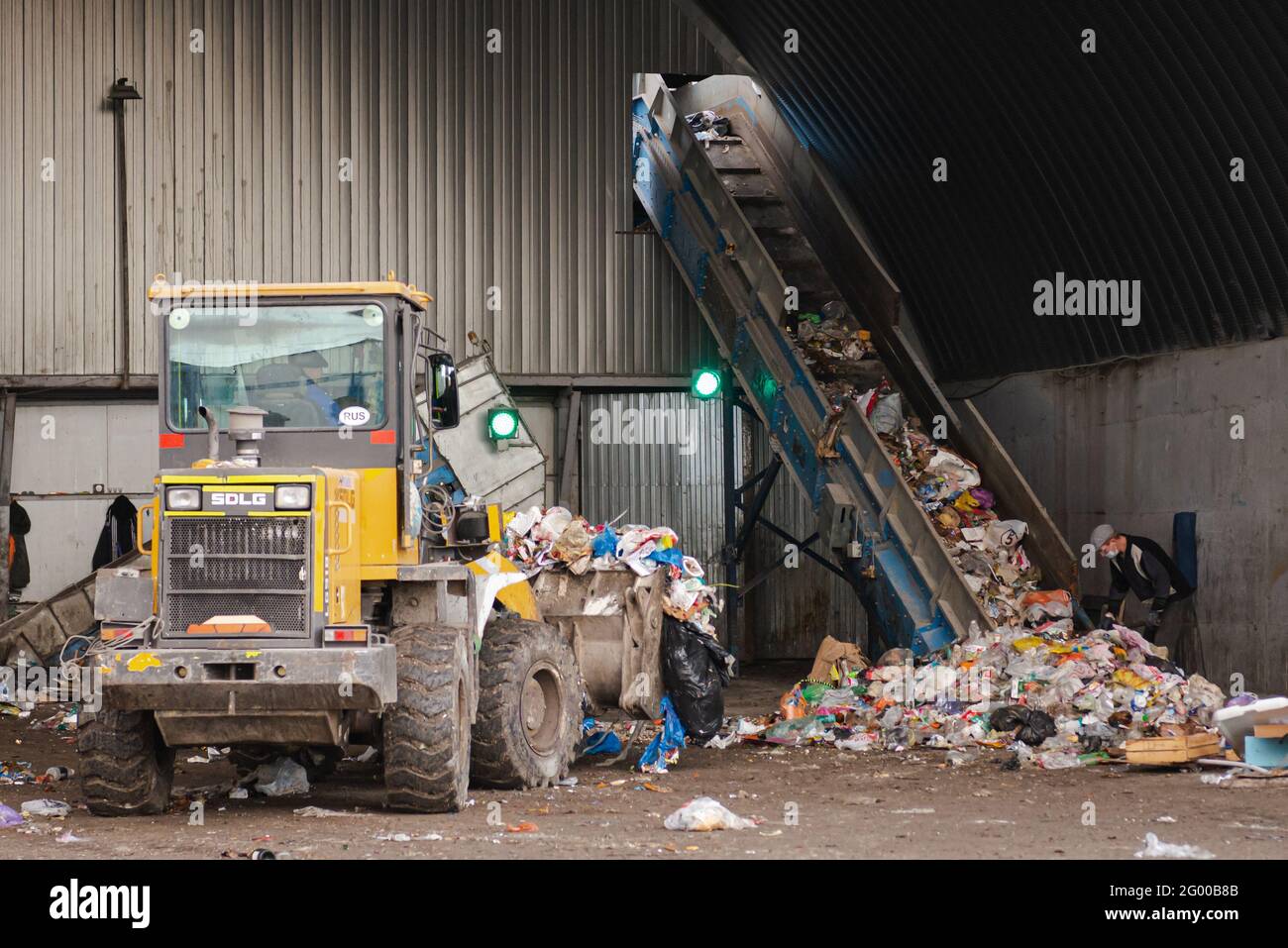 Moscow. Russia. October 2020. Garbage factory. The bulldozer brings the ...