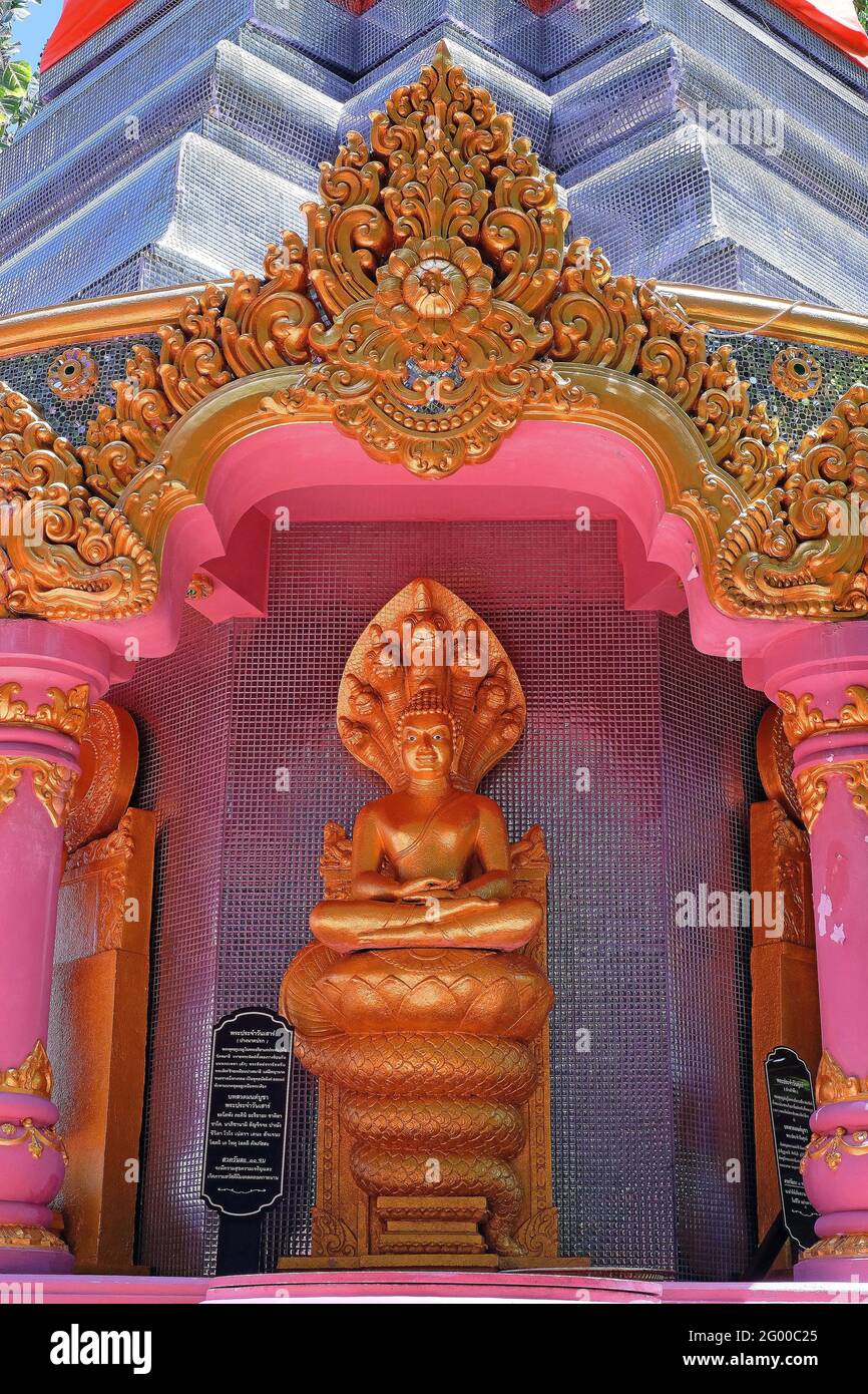 Golden Buddha image sat on a lotus throne Stock Photo - Alamy