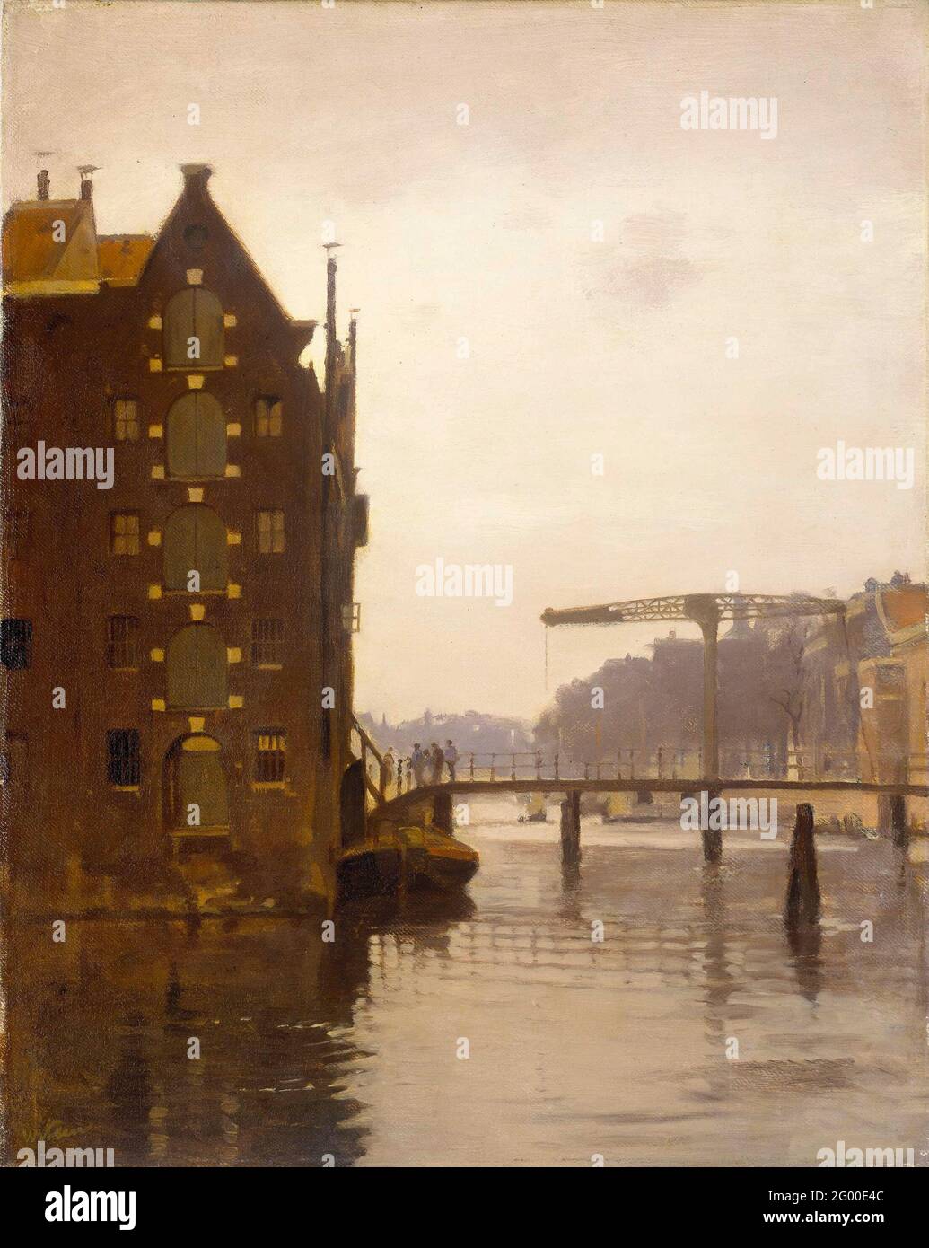 Warehouses on an Amsterdam canal on Uilenburg. Cityscape with ...