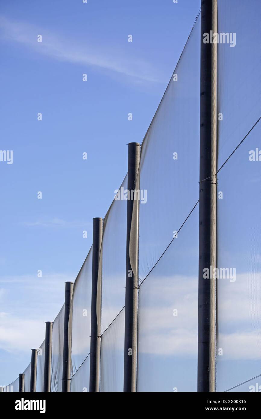 Shot of a mesh made of connected strands of metal, fiber, or other ...