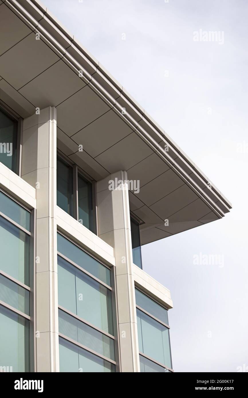 Shot of the white modern building with big windows captured from the ...