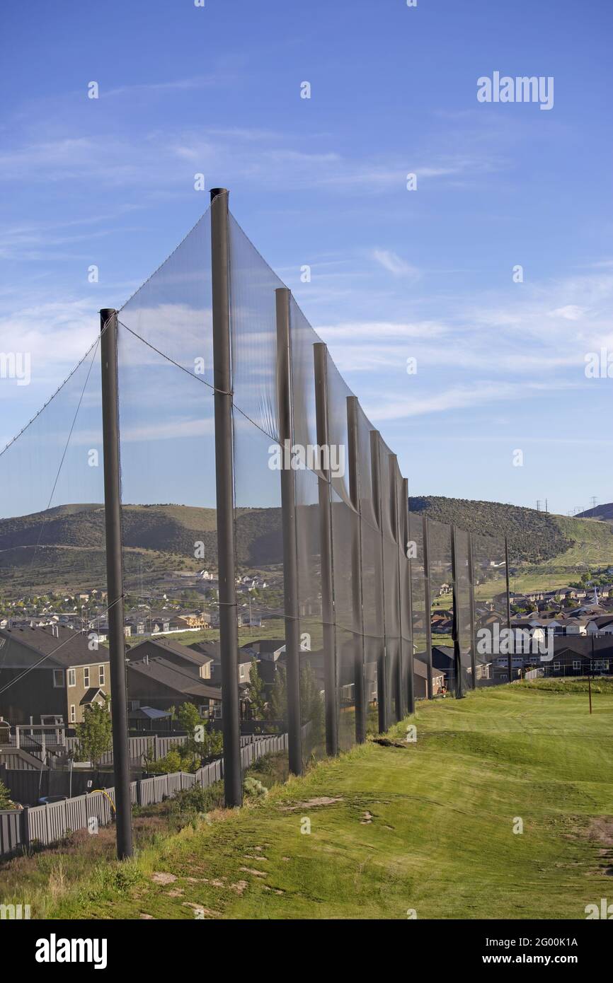 Vertical shot of a mesh made of connected strands of metal in the ...