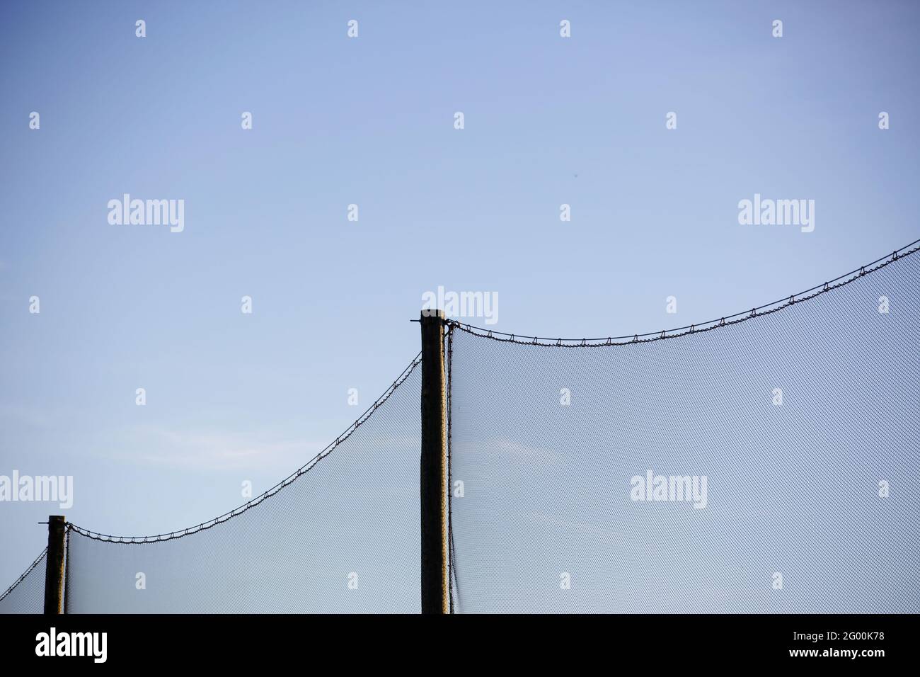 Shot of a mesh made of connected strands of metal, fiber, or other ...