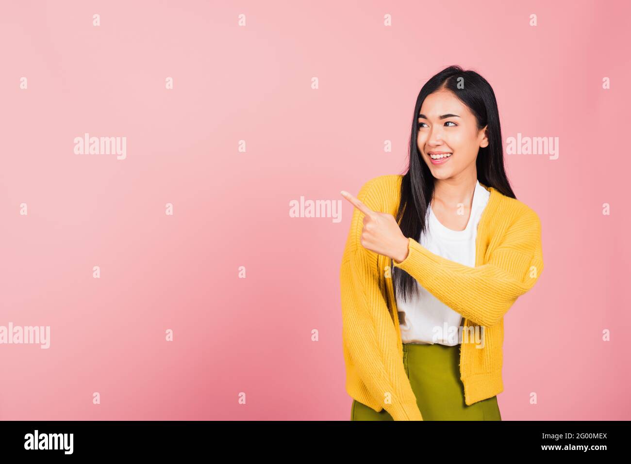Asian happy portrait beautiful cute young woman standing makes gesture ...