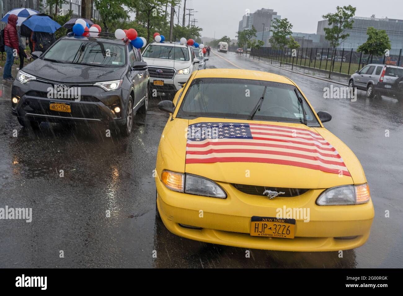 NEW YORK, NY - MAY 30: Cars lineup for the annual College Point ...