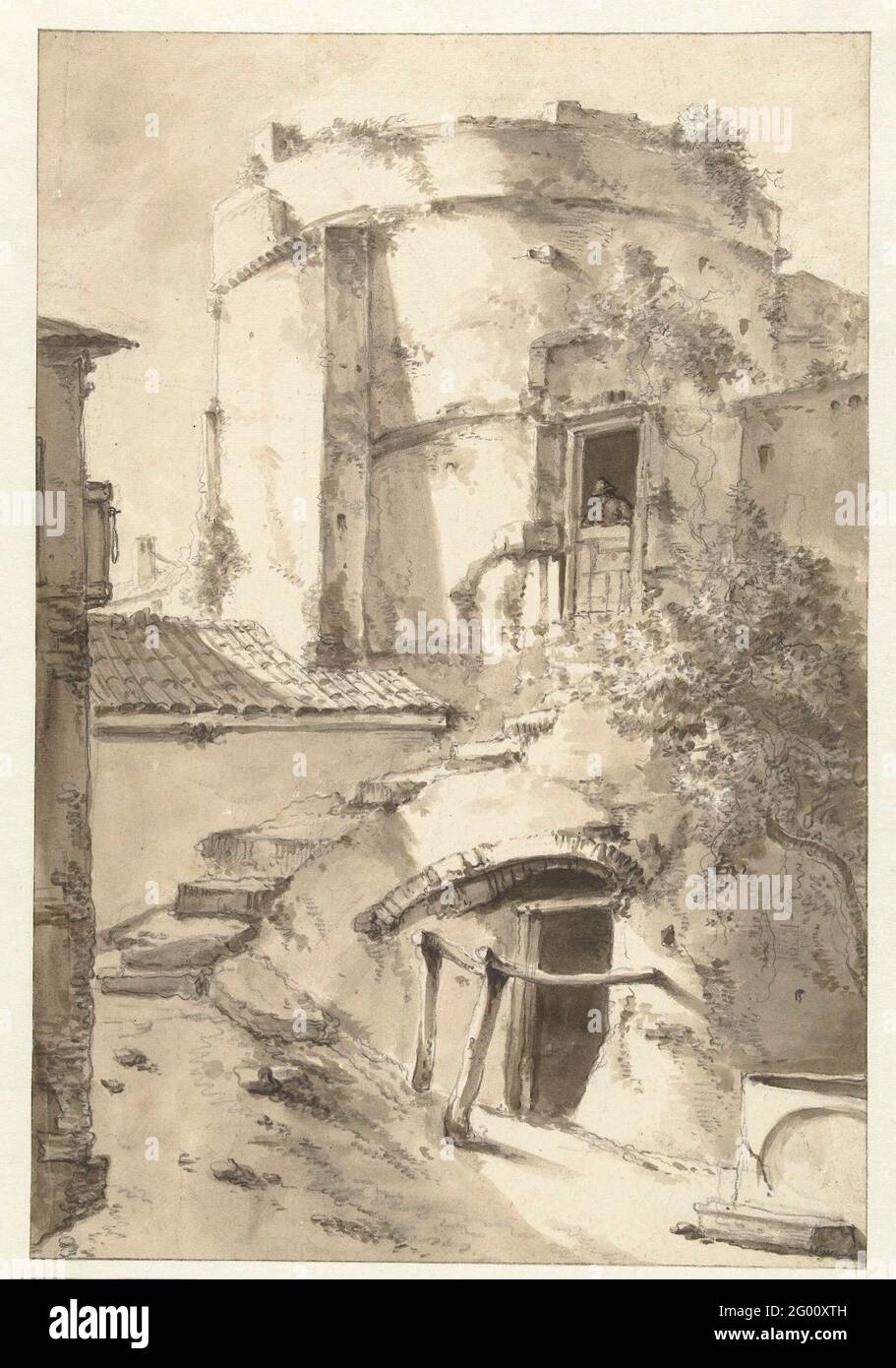 Watchtower with adjacent buildings. Round waiting tower; A man leans ...