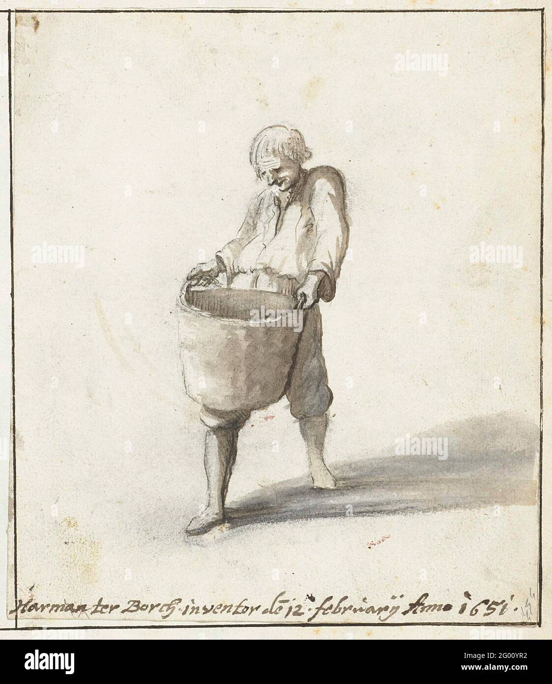 Man carrying a basket Stock Photo - Alamy