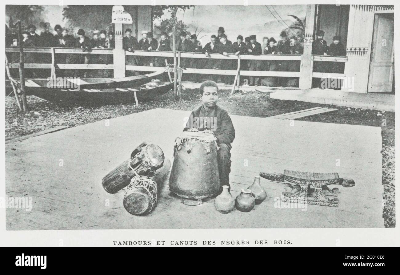 Maroon boy with drums and canoes at the colonial exhibition, Amsterdam ...