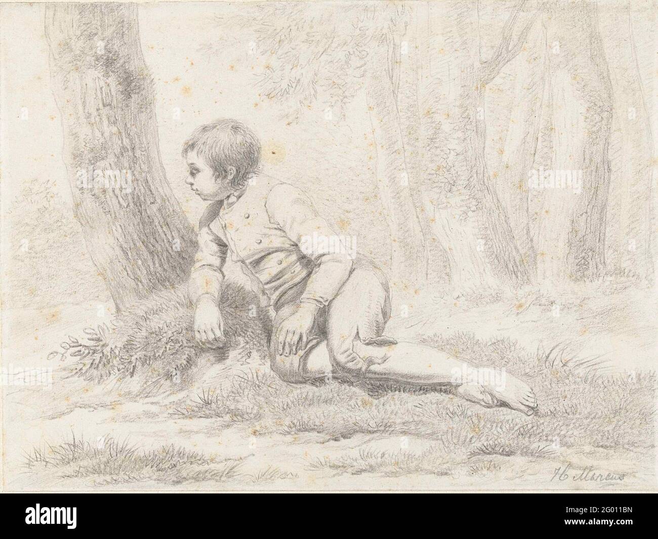 Boy under a tree lying Stock Photo - Alamy