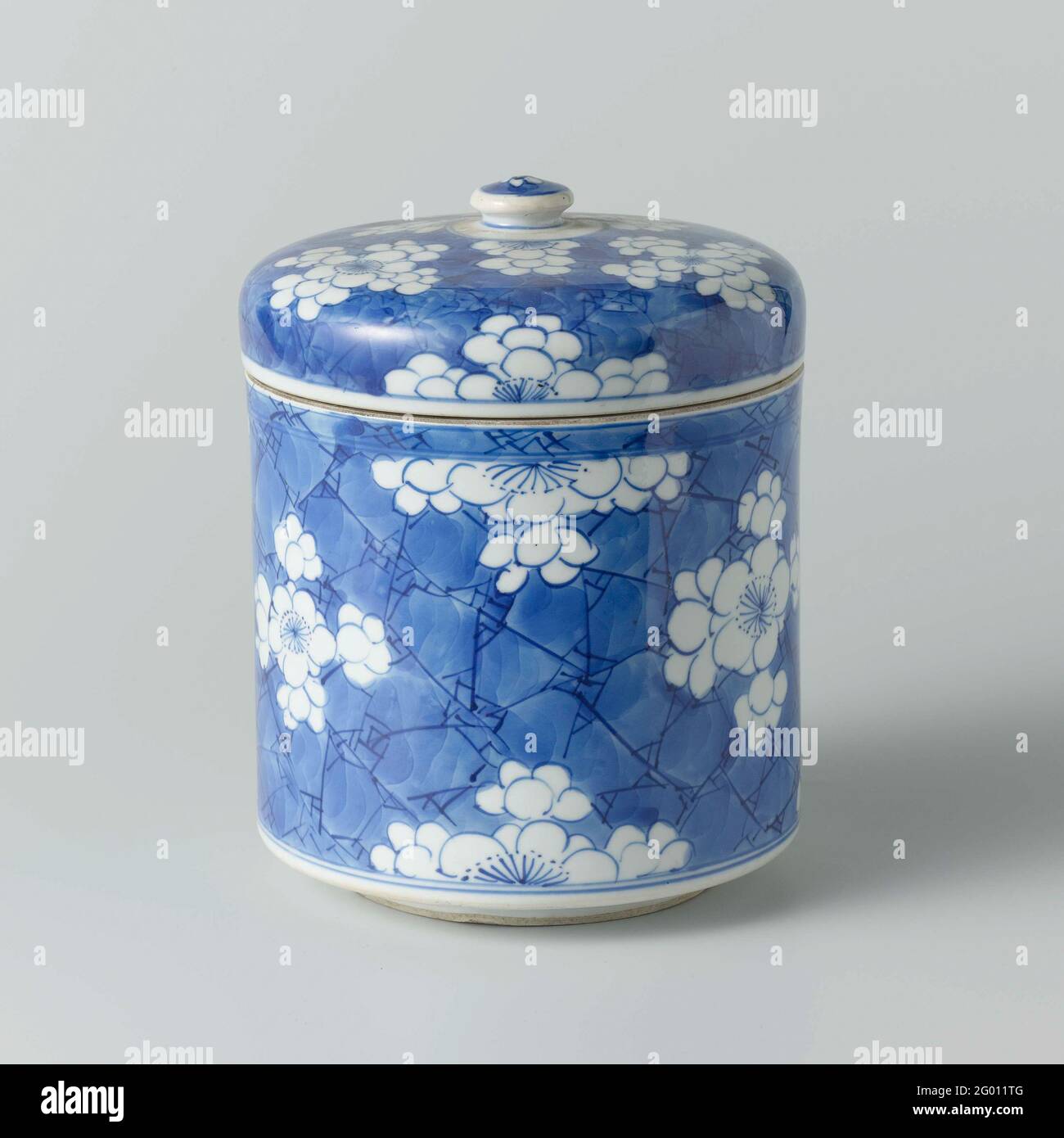 Cylindrical Covered Jar With Flower Heads in reserve. Cylindrical lid ...