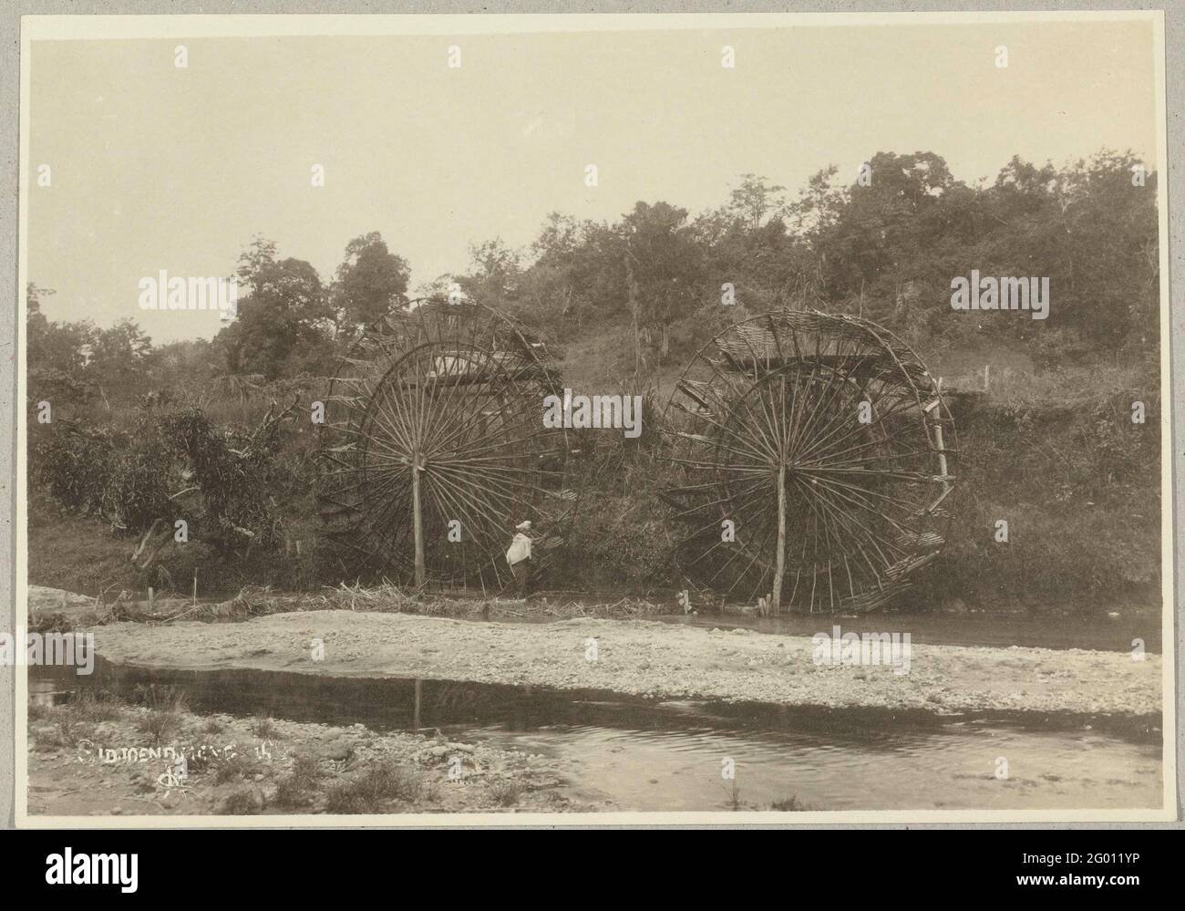 A water shavel made of wood in a river at Sijungjung.; Childhood (water ...
