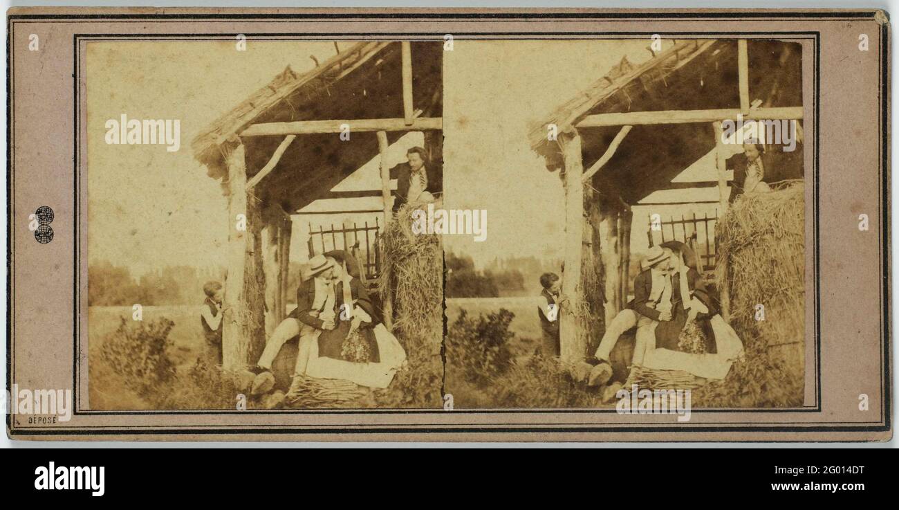 Two men play a kissing couple in a hay man Stock Photo - Alamy