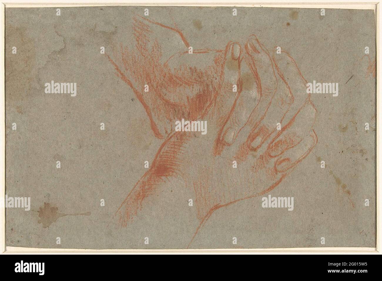 Two folded hands Stock Photo - Alamy
