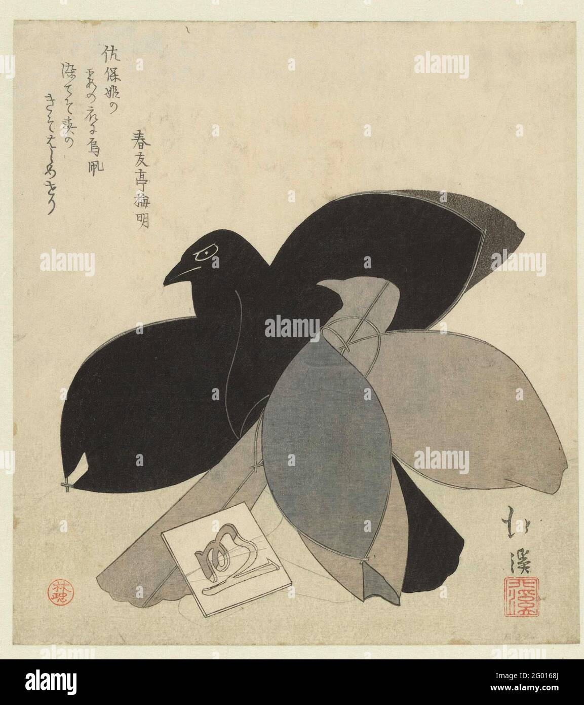 Two kites. Two kites in the shape of a crow and a falcon. The crow is ...
