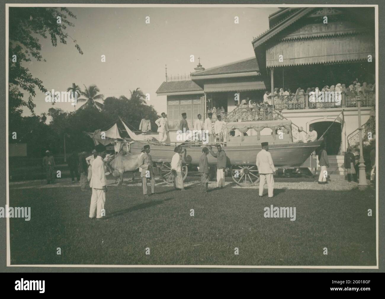 Loading truck with crew and spectators for the palace of Langkat Sultan ...