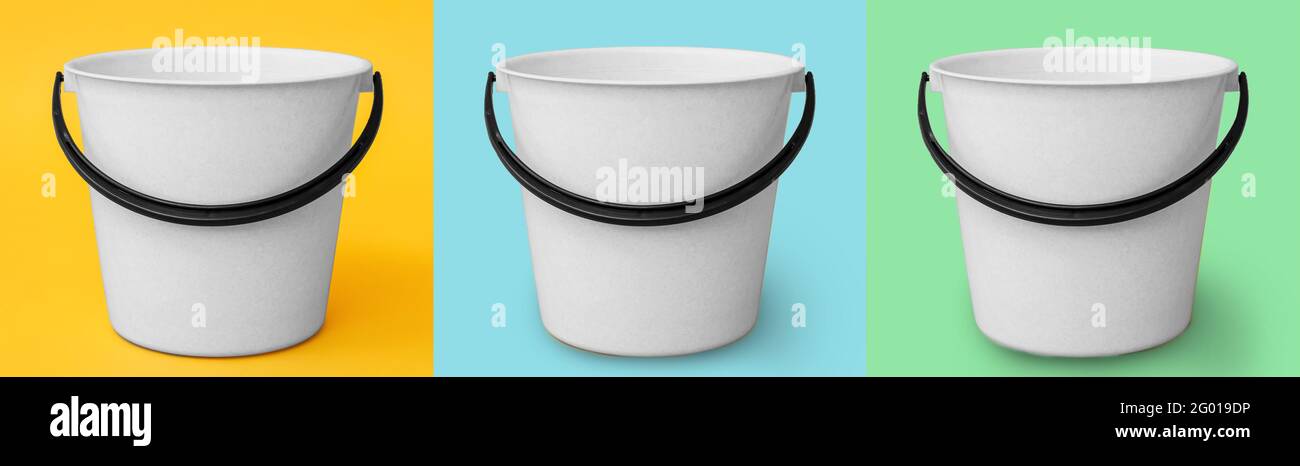 Plastic buckets on color background Stock Photo - Alamy