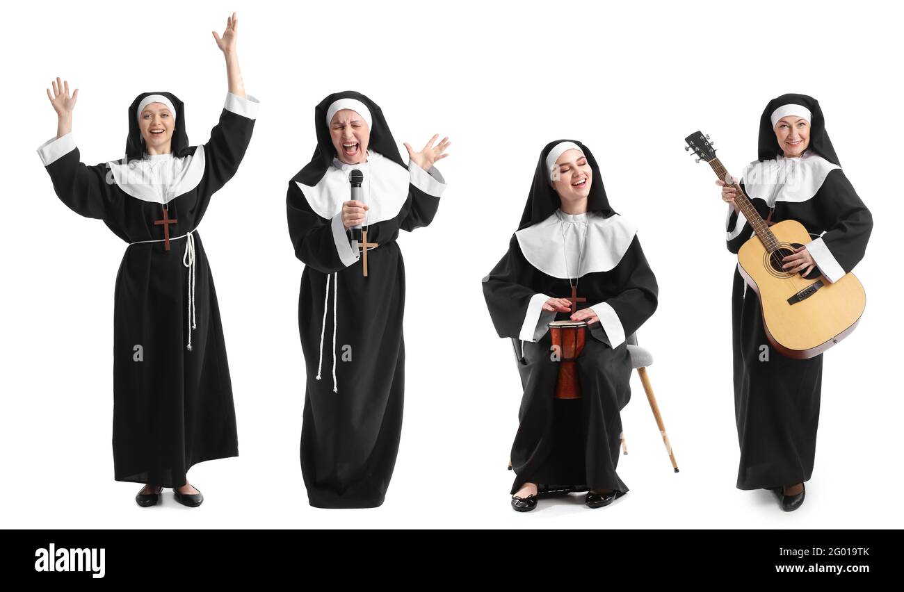 Group of funny nuns on white background Stock Photo - Alamy