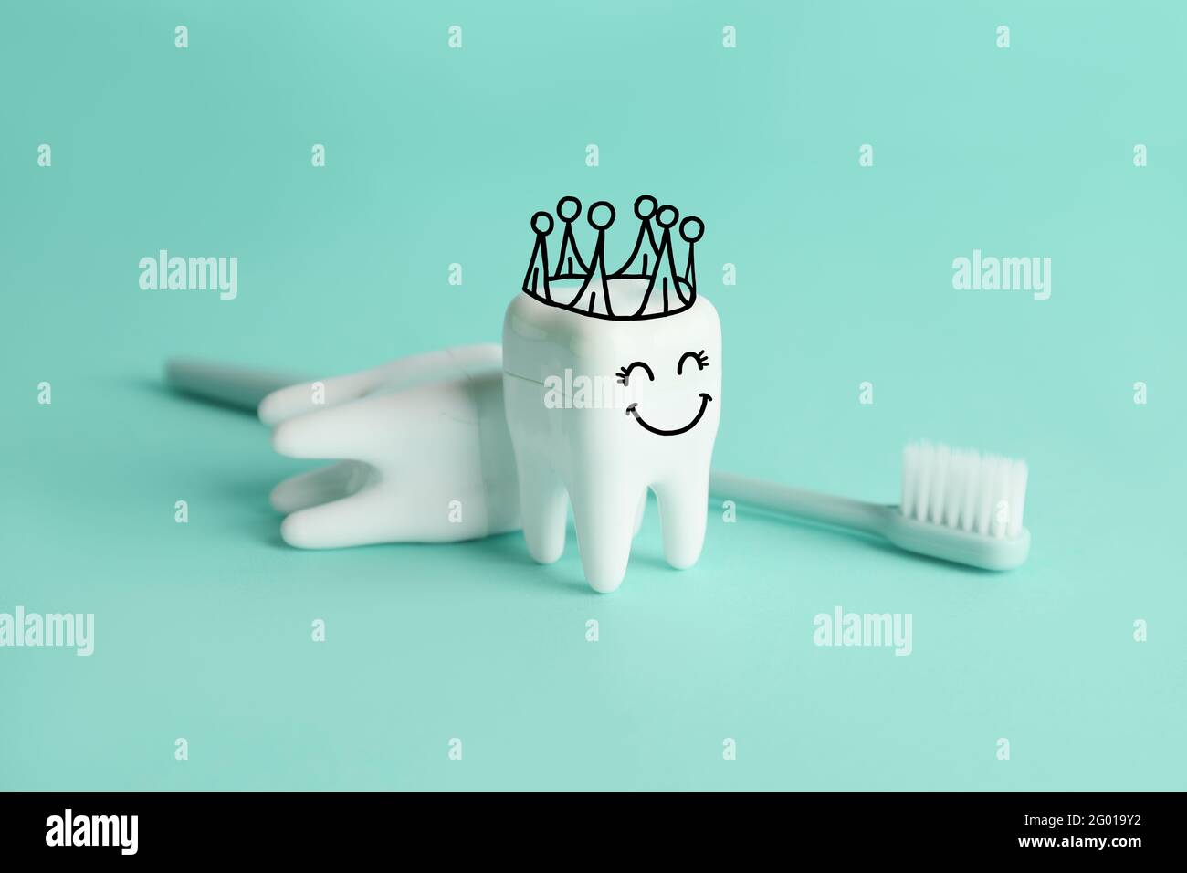 Funny teeth with toothbrush on color background Stock Photo - Alamy