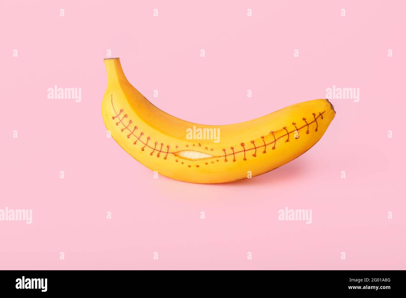 Creative composition with banana on color background Stock Photo - Alamy