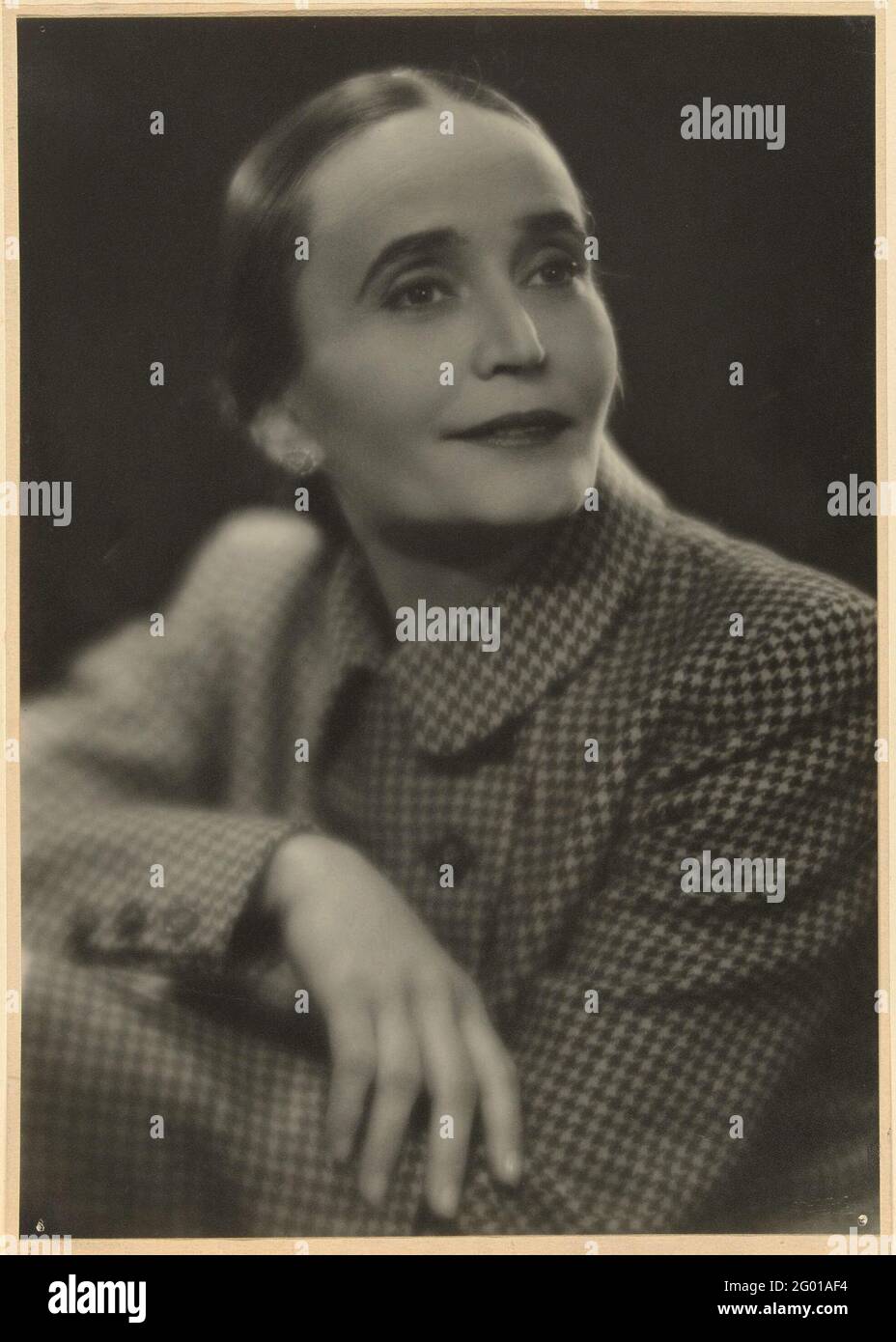 Portrait of actress nel knot in checkered cloak Stock Photo - Alamy