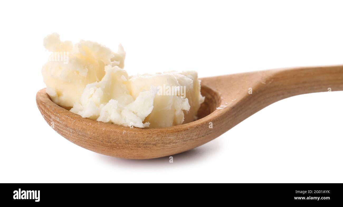 Spoon with shea butter on white background Stock Photo - Alamy