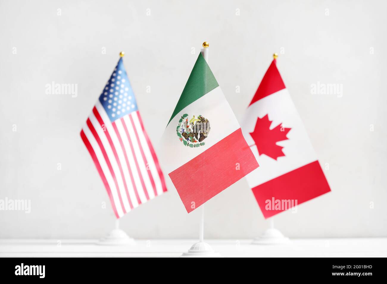 Different flags on light background Stock Photo - Alamy
