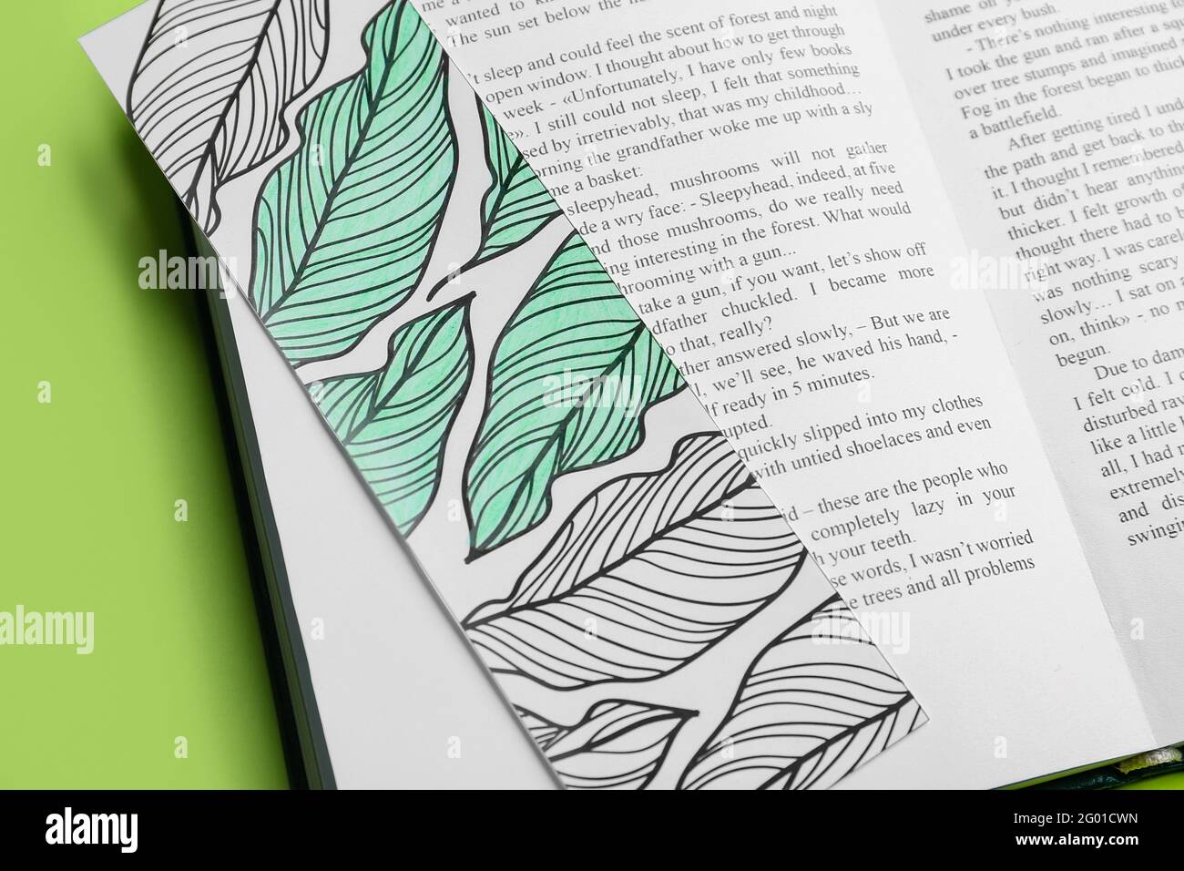 Cute bookmark with book on color background, closeup Stock Photo - Alamy