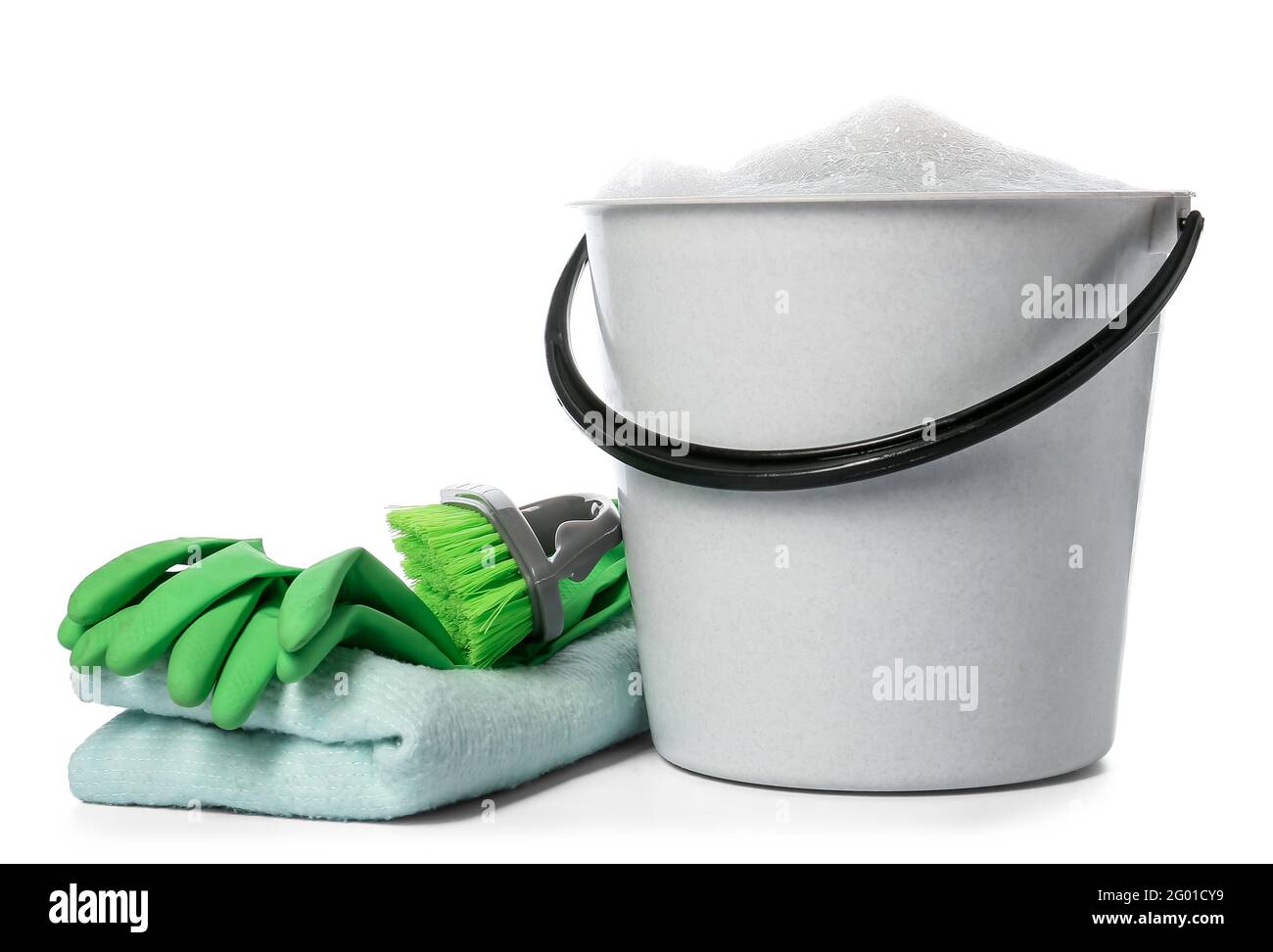 Bucket with cleaning supplies on white background Stock Photo - Alamy