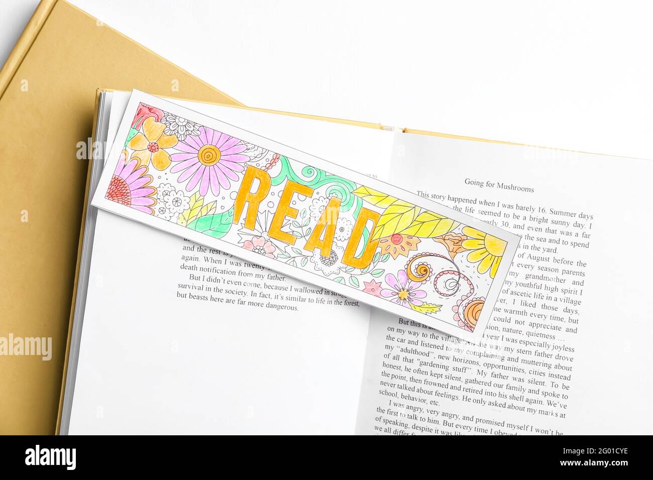 Cute bookmark with books on white background Stock Photo - Alamy