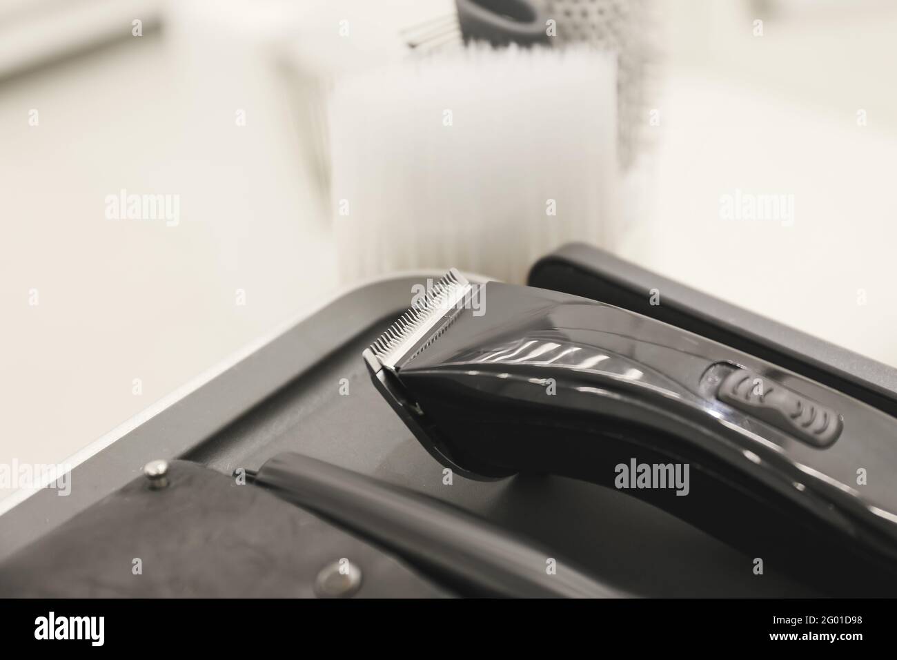 Modern hair clipper in salon, closeup Stock Photo - Alamy