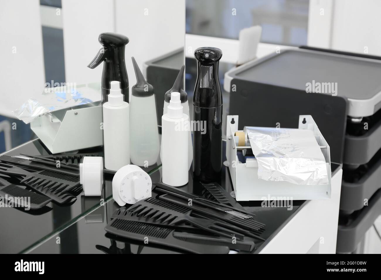 Set of professional hairdresser's tools on table in salon Stock Photo ...