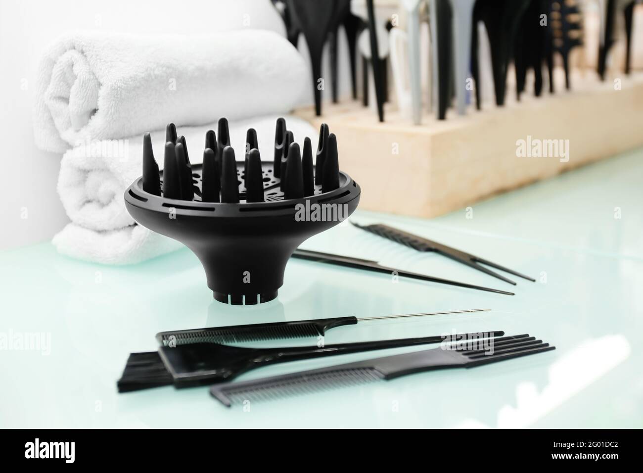 Set of professional hairdresser's tools on table in salon Stock Photo ...