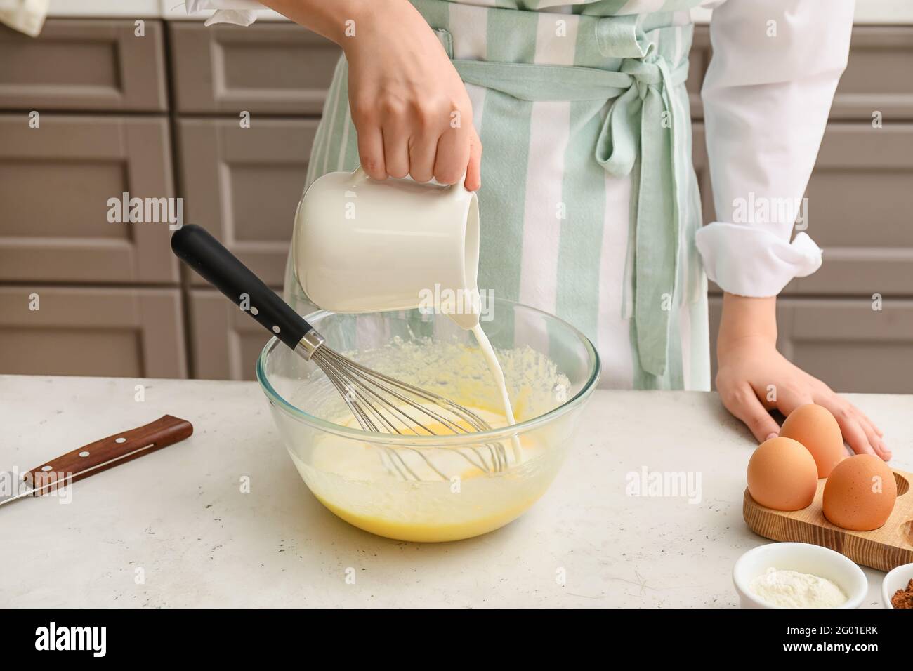 woman-preparing-pastry-in-kitchen-stock-photo-alamy