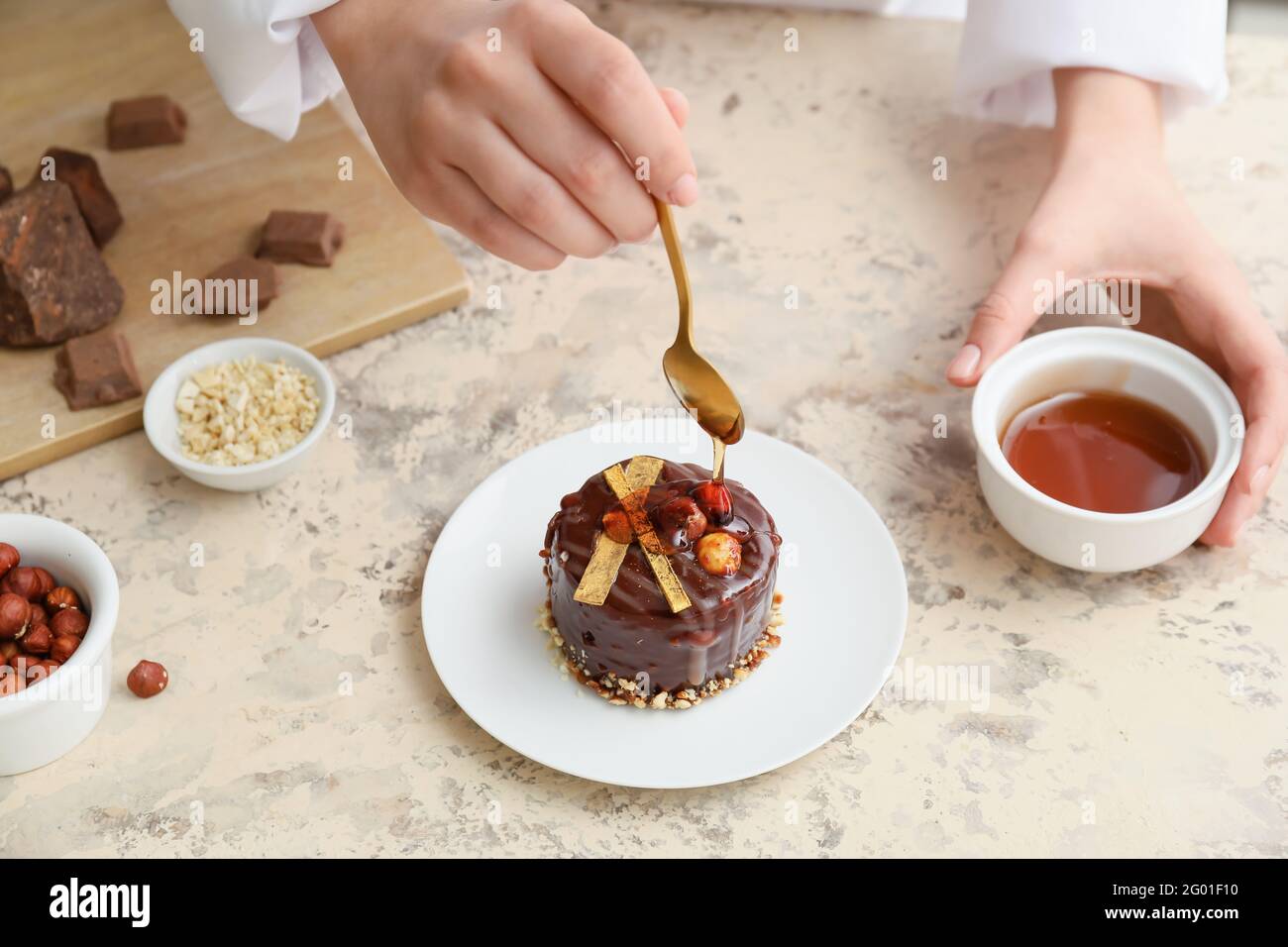 Process pouring chocolate on products hi-res stock photography and ...