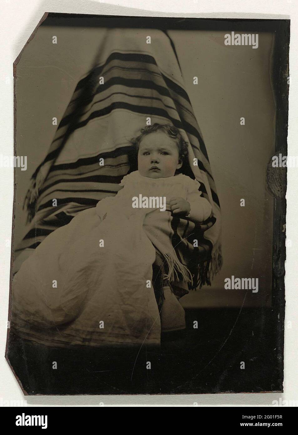Portrait of a girl, with her mother's hidden behind her under a cloth ...