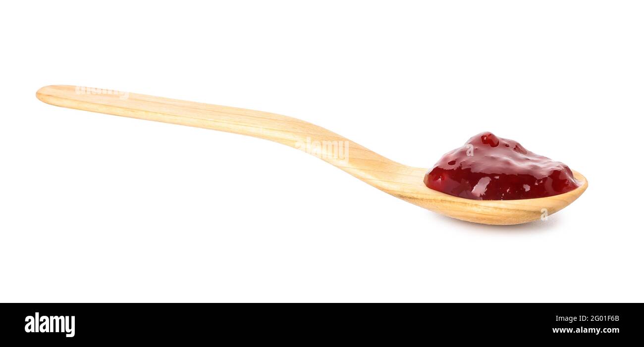 Spoon with tasty jam on white background Stock Photo - Alamy
