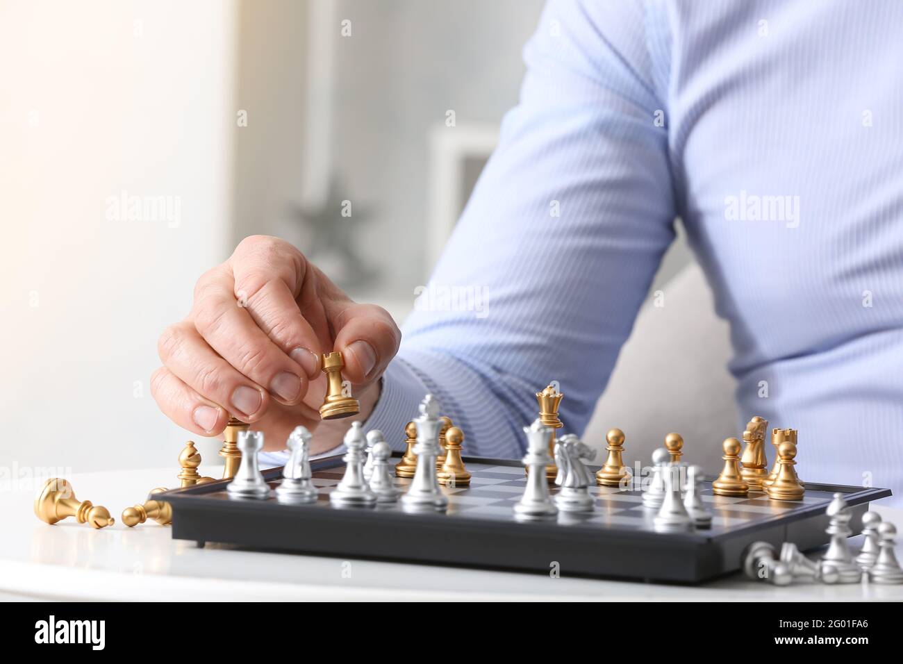 Business man chess table player hi-res stock photography and images - Alamy
