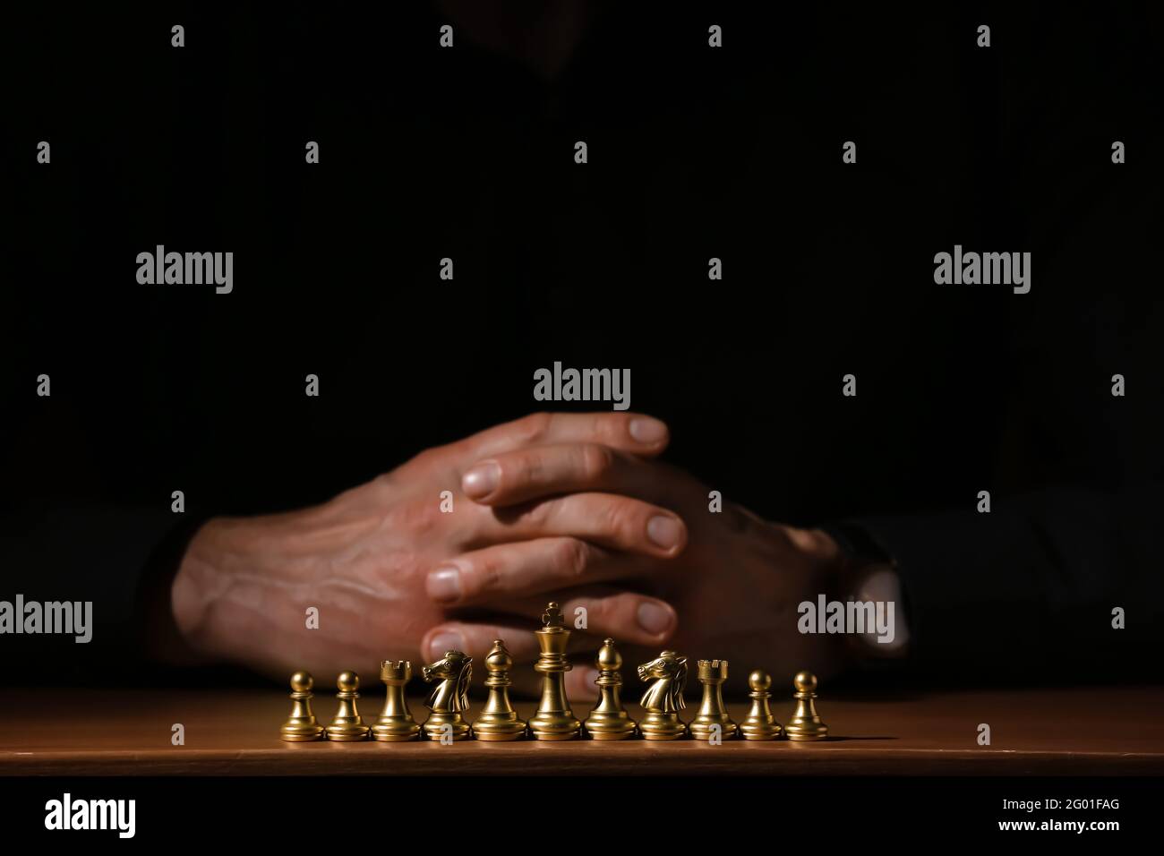 Man playing chess on dark background, closeup Stock Photo - Alamy