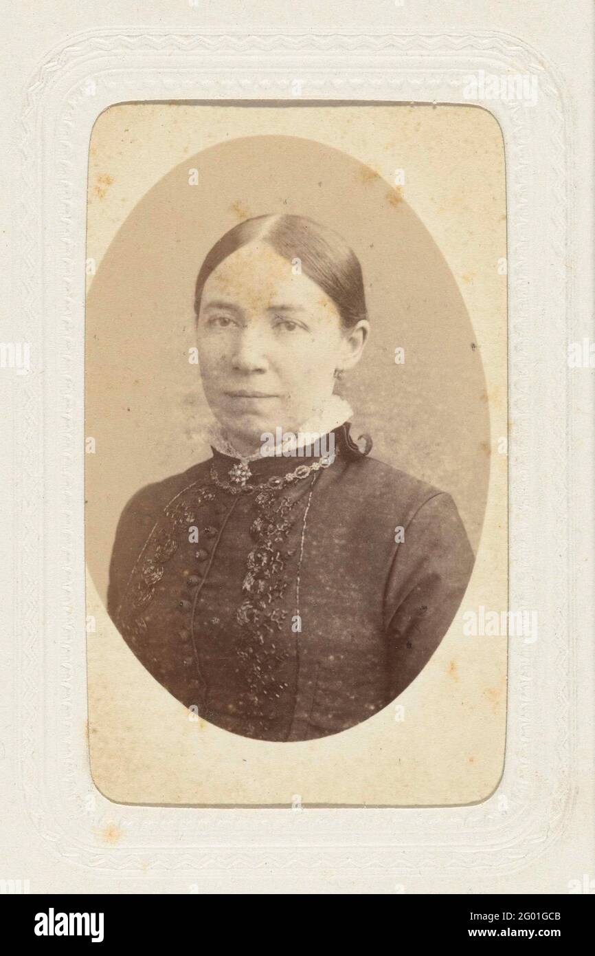 Studio portrait of a woman with raised hair Stock Photo - Alamy