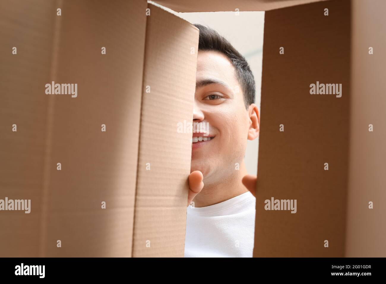 Closeup view man unpacking hi-res stock photography and images - Alamy