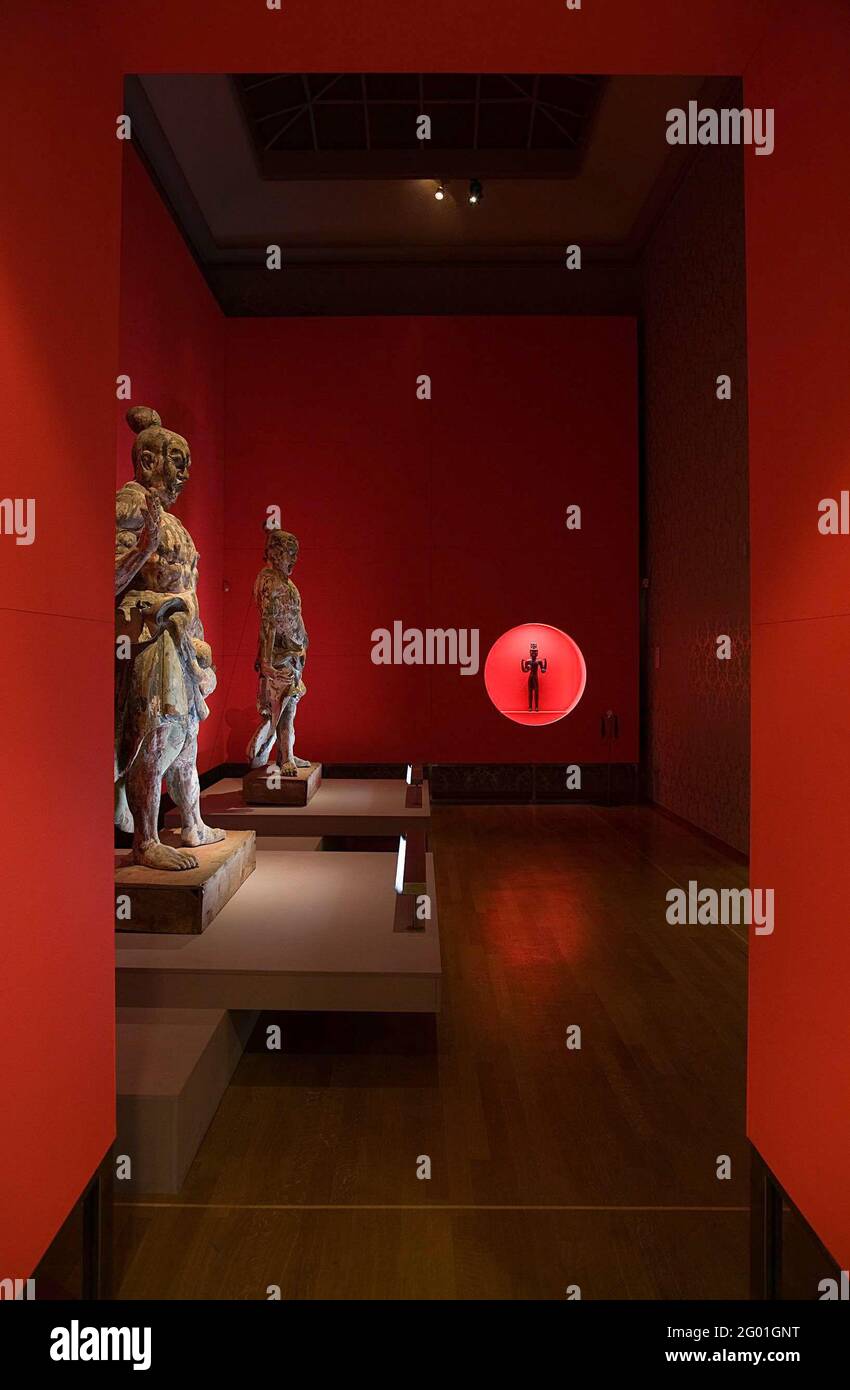 Passage to a room with two images of Japanese temple guards and an ...